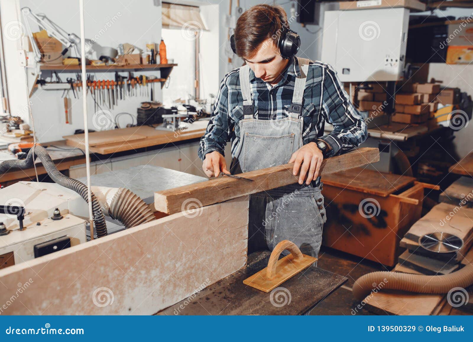 The Carpenter Works with a Tree Stock Image - Image of chisel, handwork ...
