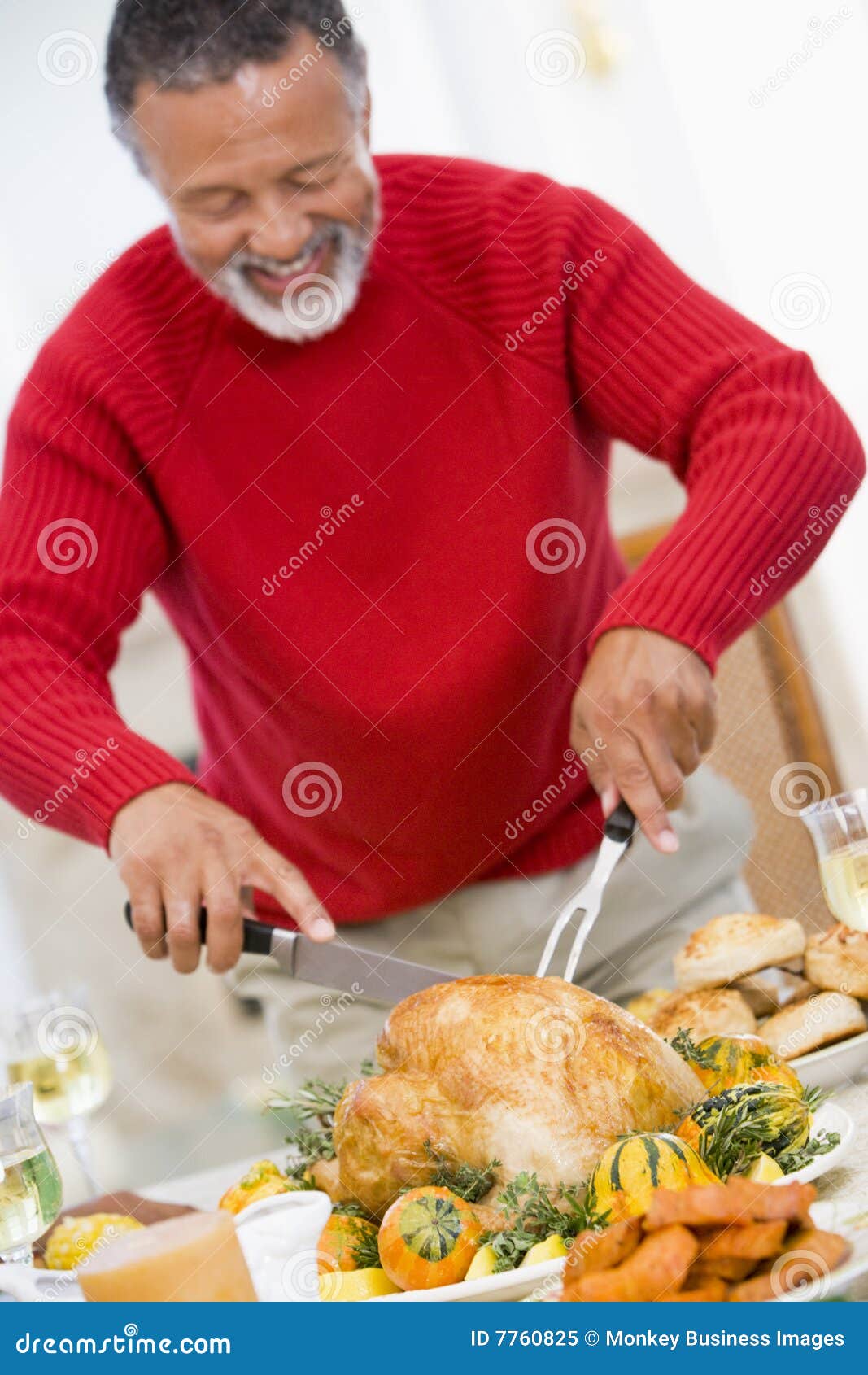 Man Carving Roast Chicken stock image. Image of dinner - 7760825