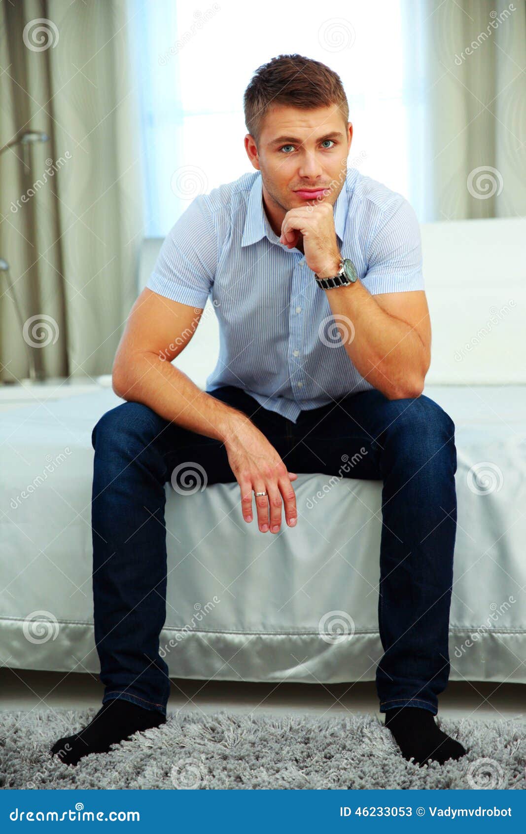 Man in Casual Cloth Sitting on the Bed Stock Image - Image of inside ...