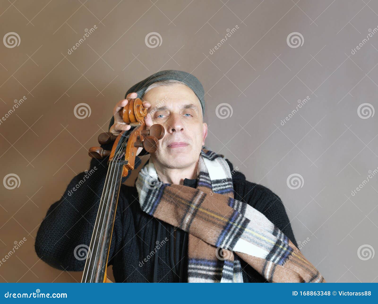 Man in Casual Posing with Celoo Stock Photo - Image of strings, casual ...