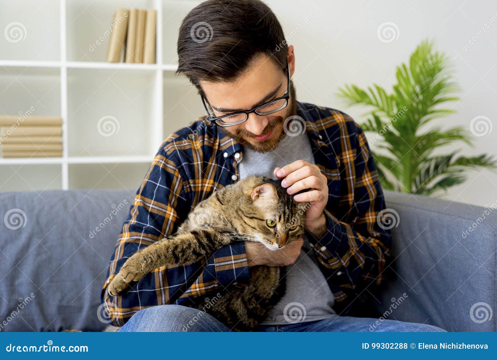 Man with a cat stock photo. Image of lifestyle, cheerful - 99302288