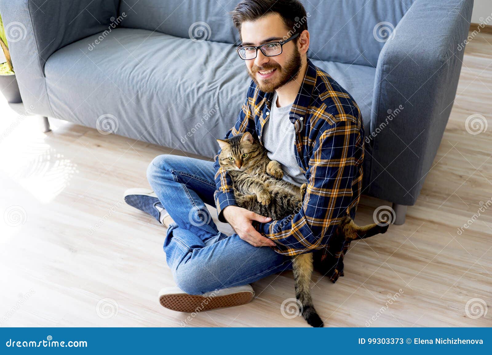 Man with a cat stock image. Image of young, parent, life - 99303373