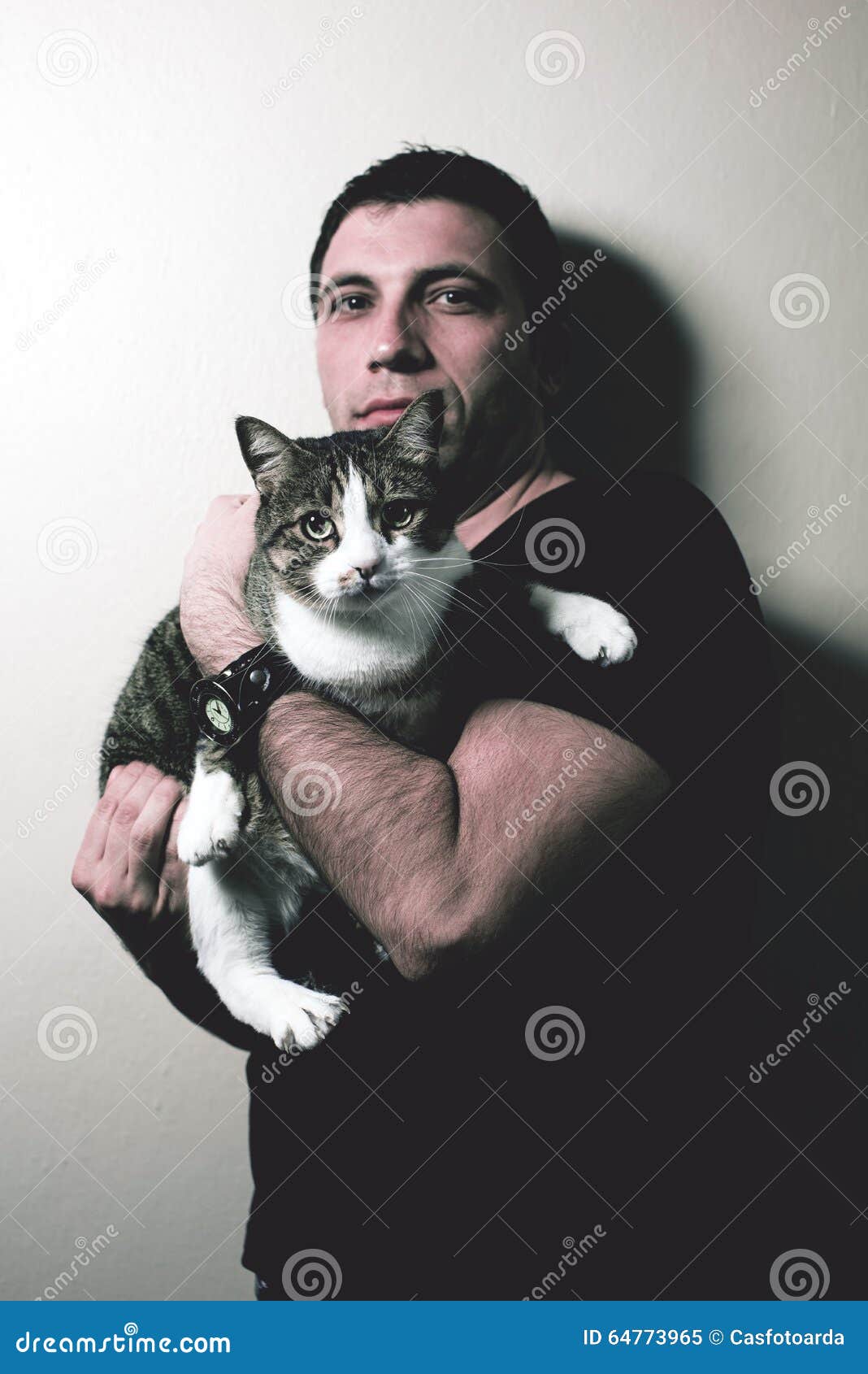 Man with a cat stock image. Image of tabby, owner, lifestyle - 64773965