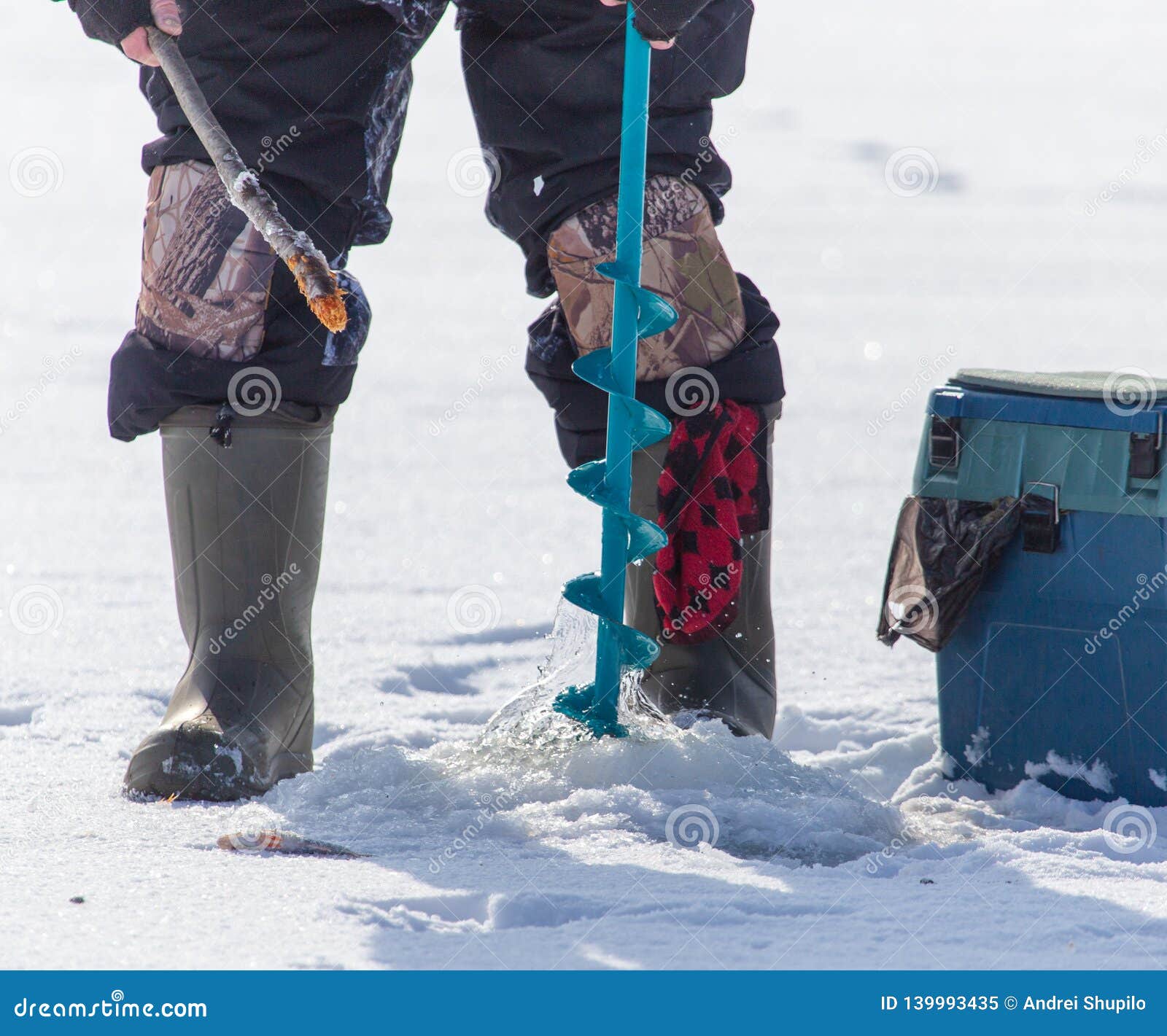 Man Catches Fish on Ice in Winter Stock Image - Image of season ...