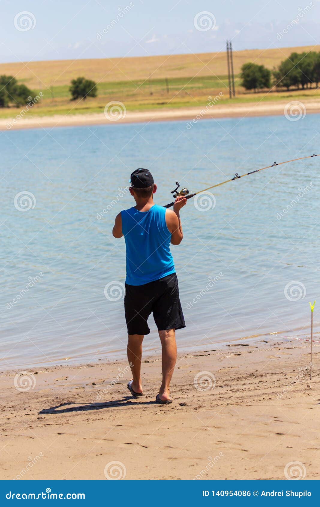A Man Catches Fish on the Lake Stock Photo - Image of river, outdoor ...