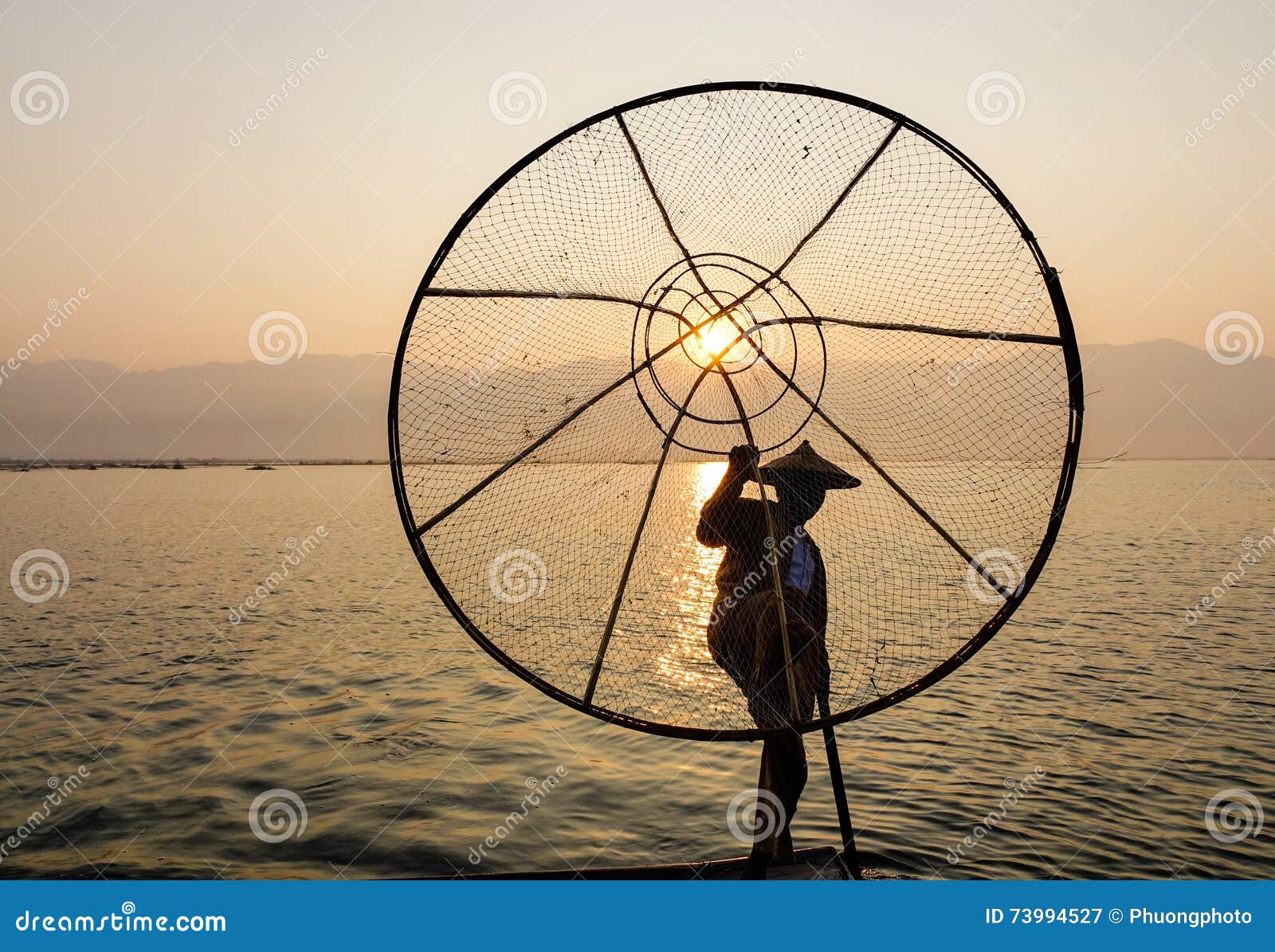 A Man Catching Fish on the Lake in Inle, Myanmar Editorial Photography ...