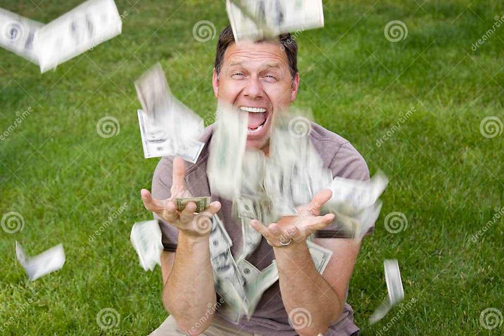 Man catching paper money stock photo. Image of income - 2635558