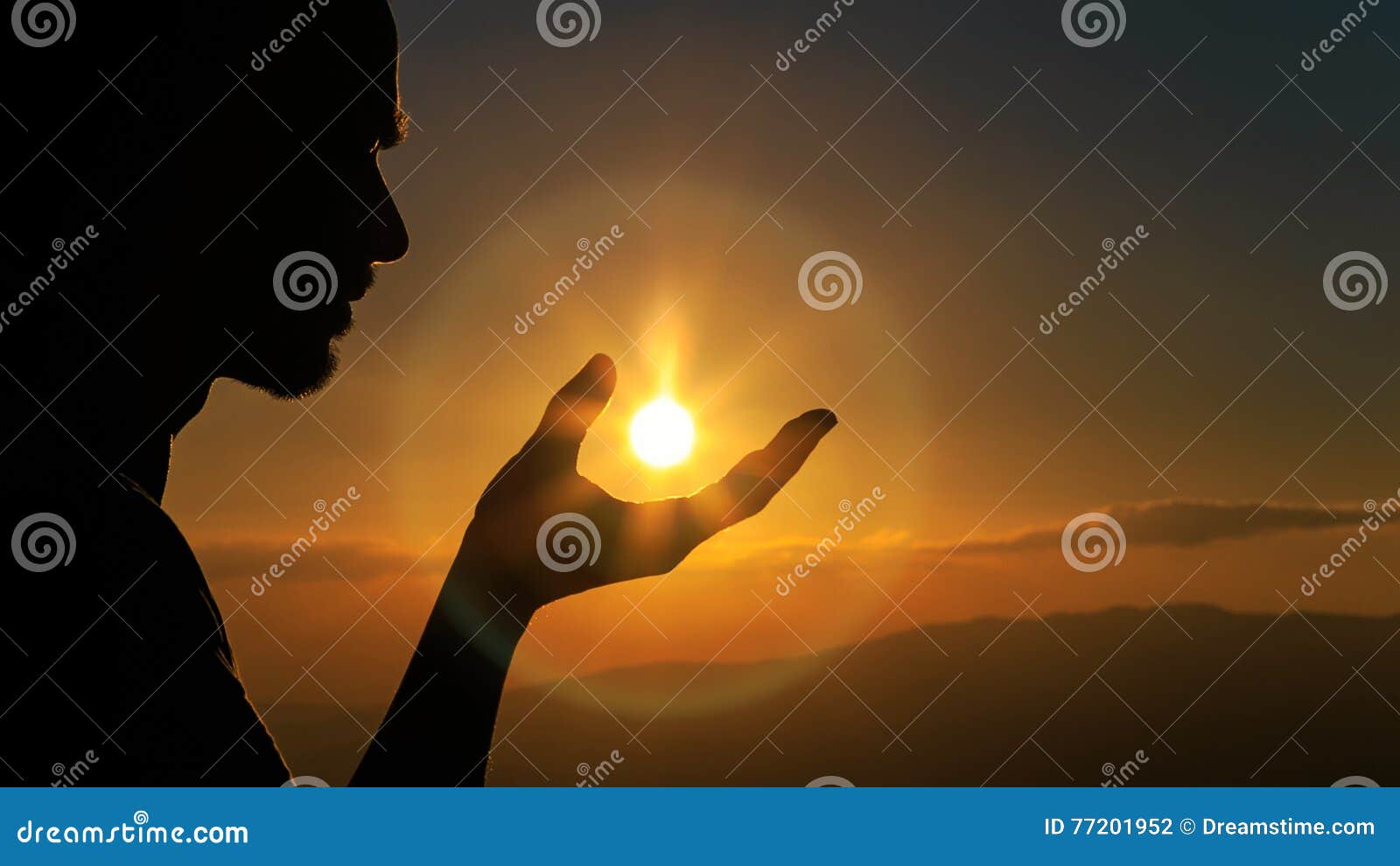A man catching the sun. stock photo. Image of hand, buddha - 77201952