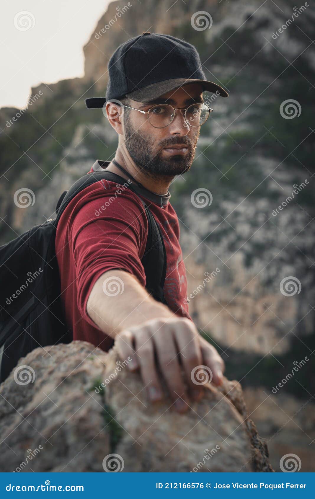 Man Caught on a Rock Looking Deep Stock Photo - Image of face ...