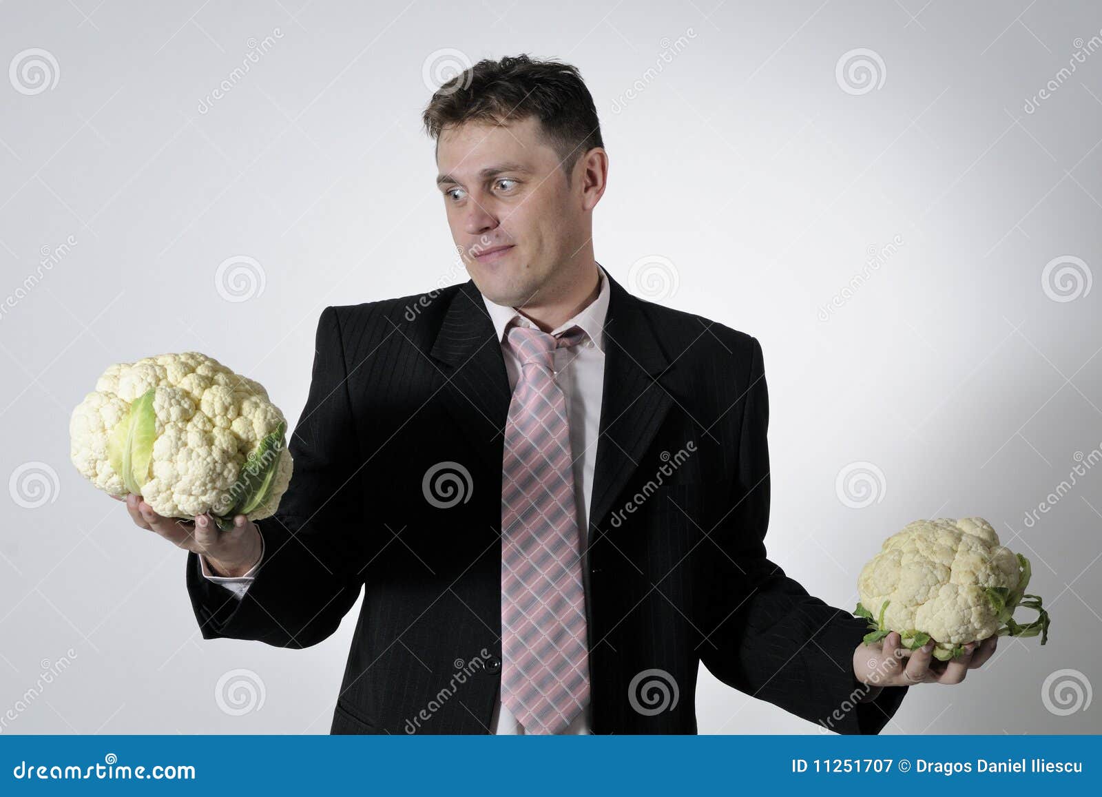 Man with cauliflowers stock image. Image of vegetable - 11251707
