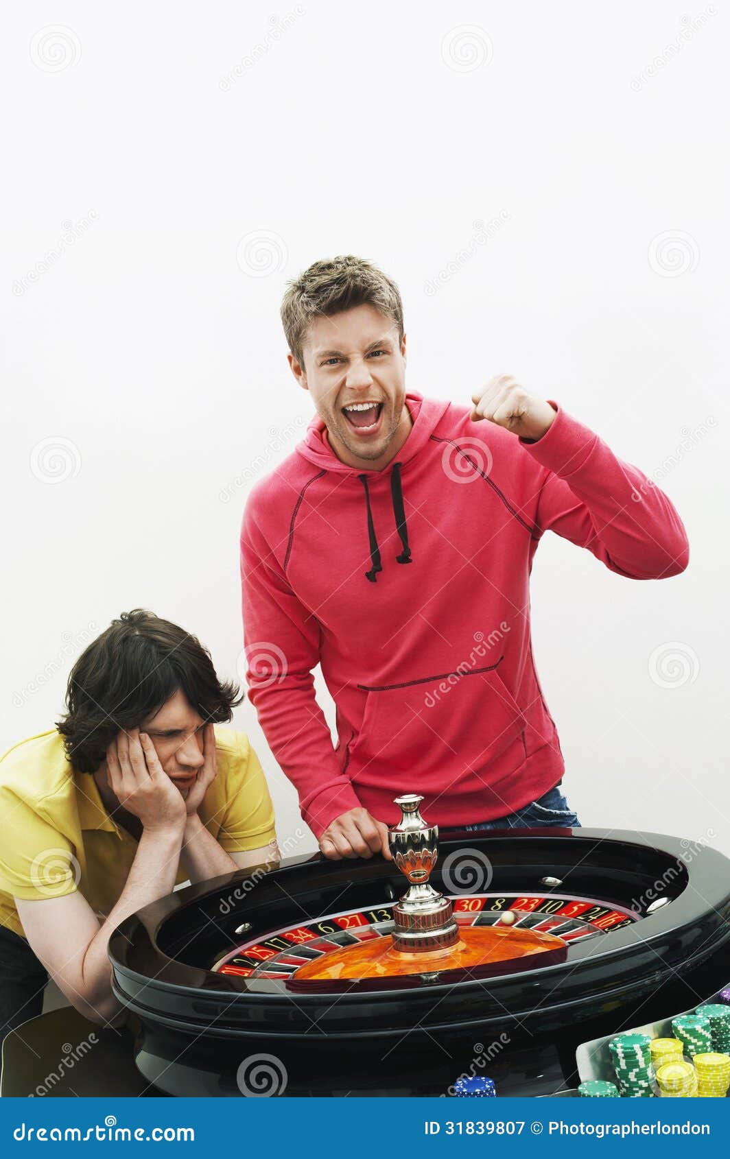 Man Celebrating Gambling Win at Roulette Table Stock Image - Image of ...
