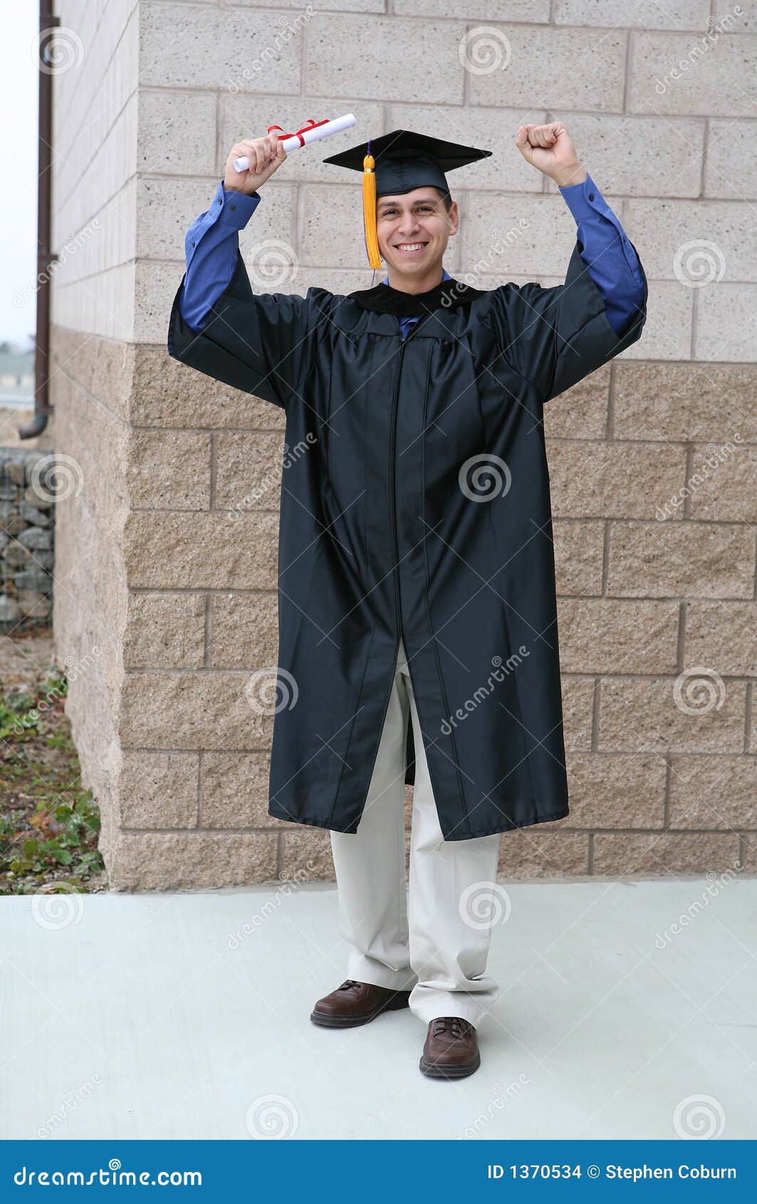 Man Celebrating Graduation stock photo. Image of degree - 1370534