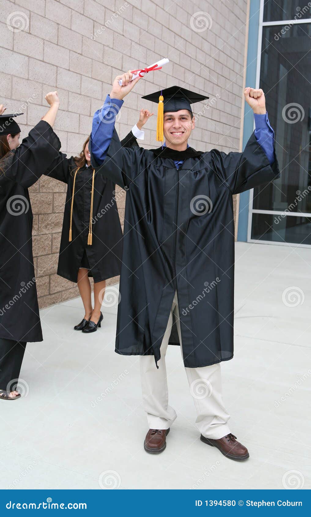 Man Celebrating Graduation stock photo. Image of accomplishment - 1394580