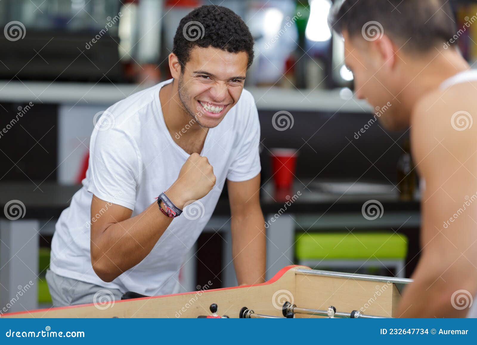 Man Celebrating Win on Table Football Game Stock Photo - Image of ...
