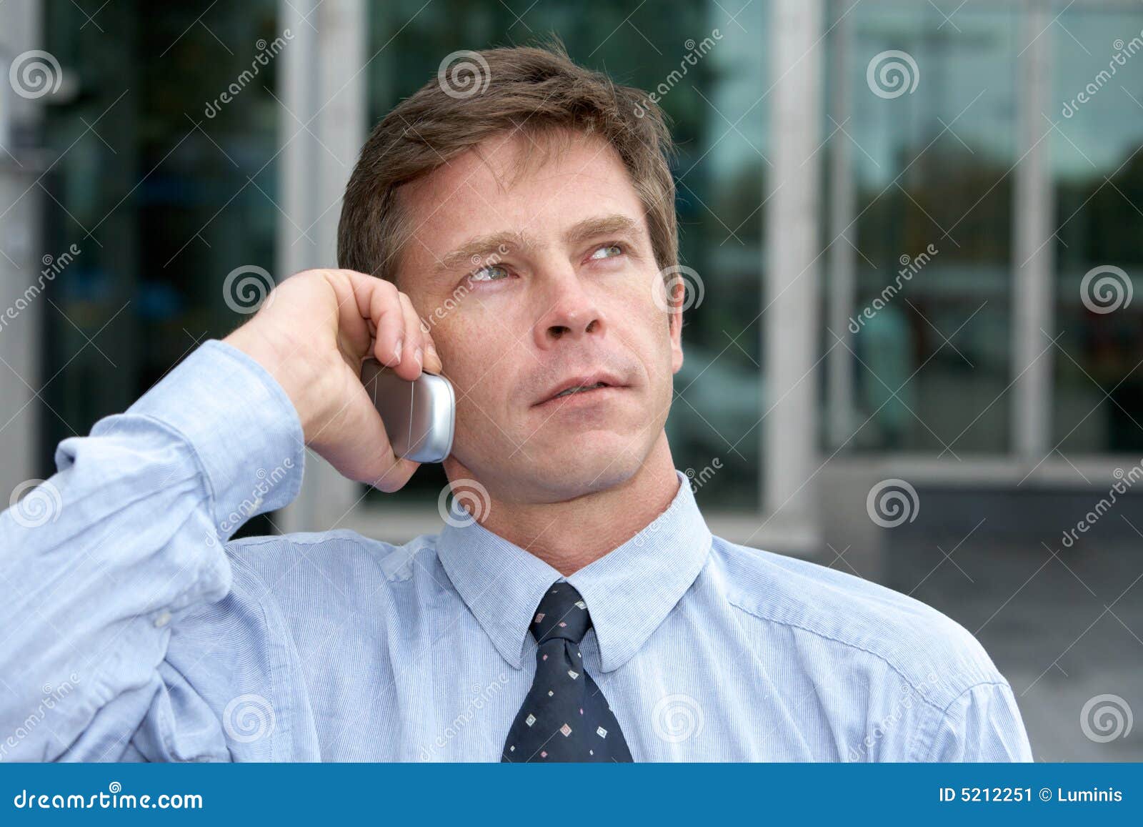 Man with cell phone stock image. Image of technology, gazing - 5212251
