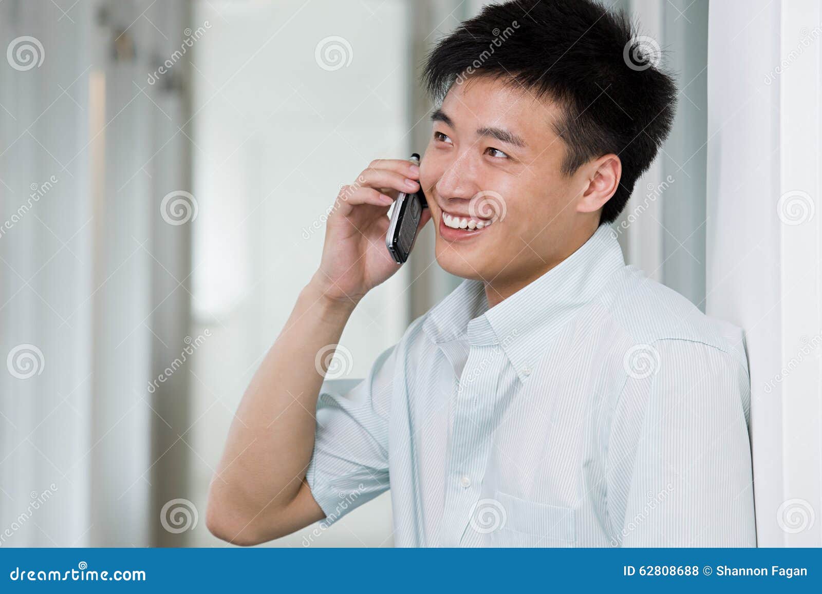 Man on cellphone stock photo. Image of career, indoors - 62808688