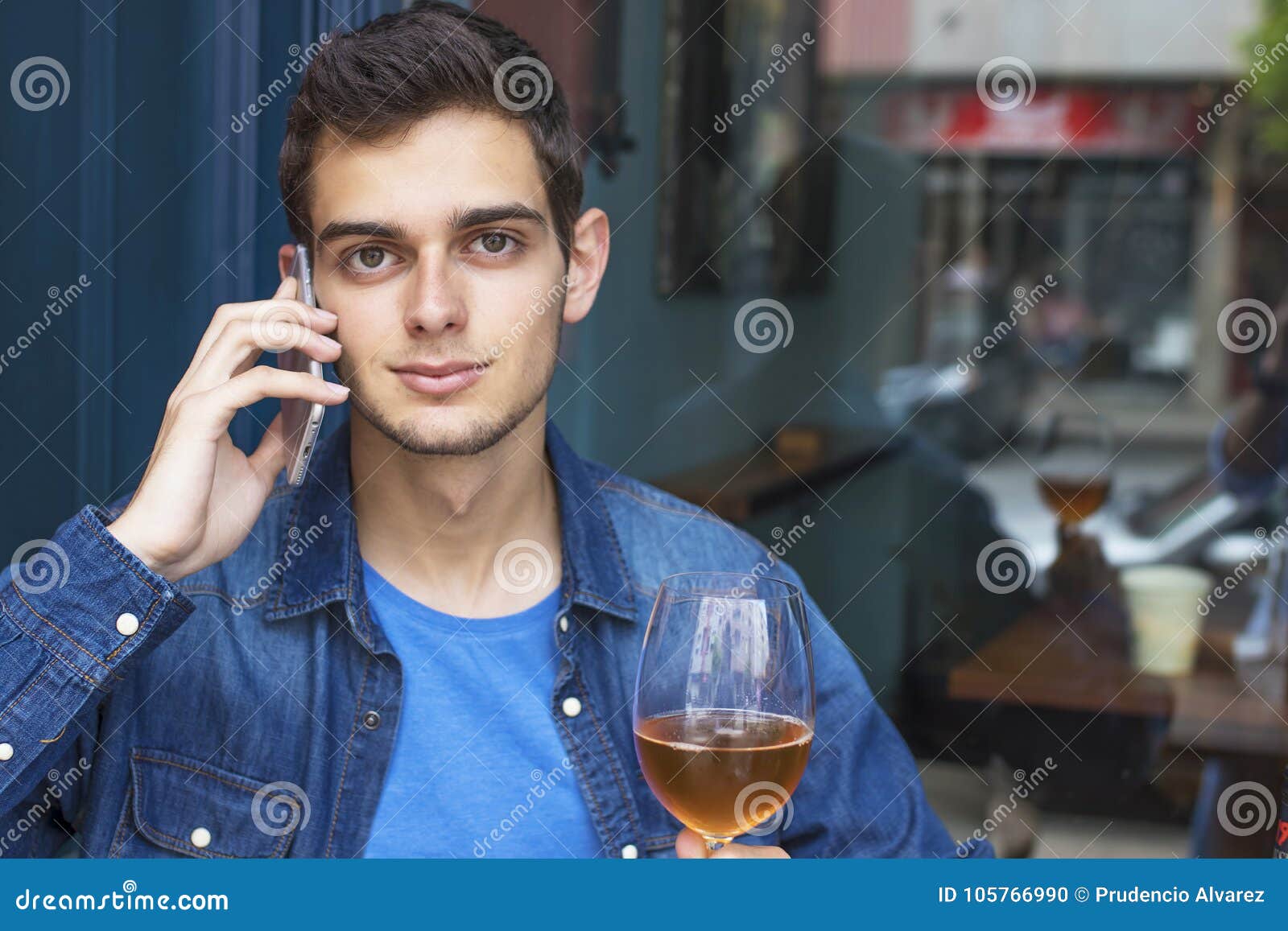 Man with the Cellphone in the Bar Stock Photo - Image of smiling ...