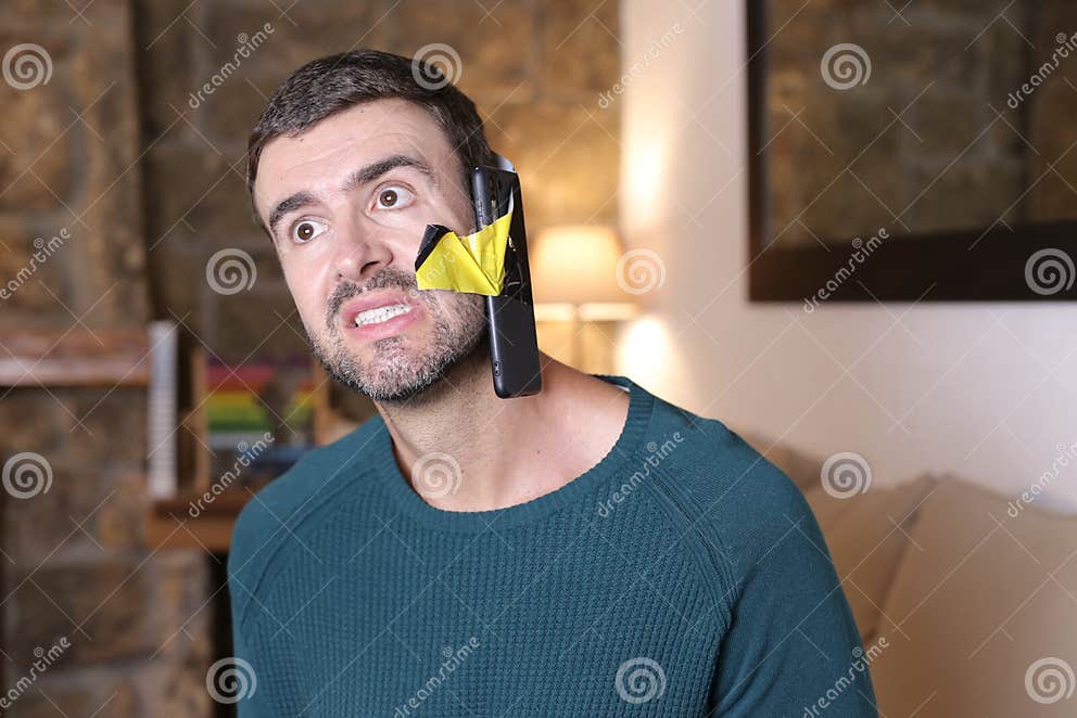Man with Cellphone Glued To Face Stock Image - Image of audio ...