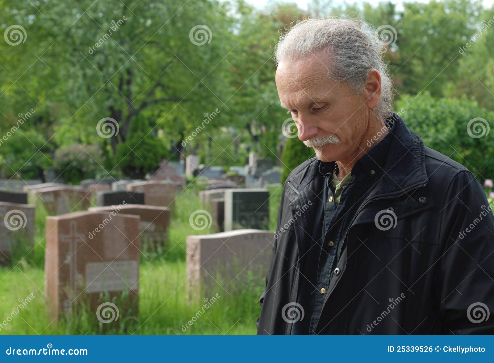 Man in cemetery stock photo. Image of isolated, mourning - 25339526