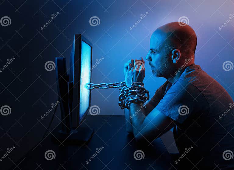 Man chained to computer stock photo. Image of media, desk - 50763118