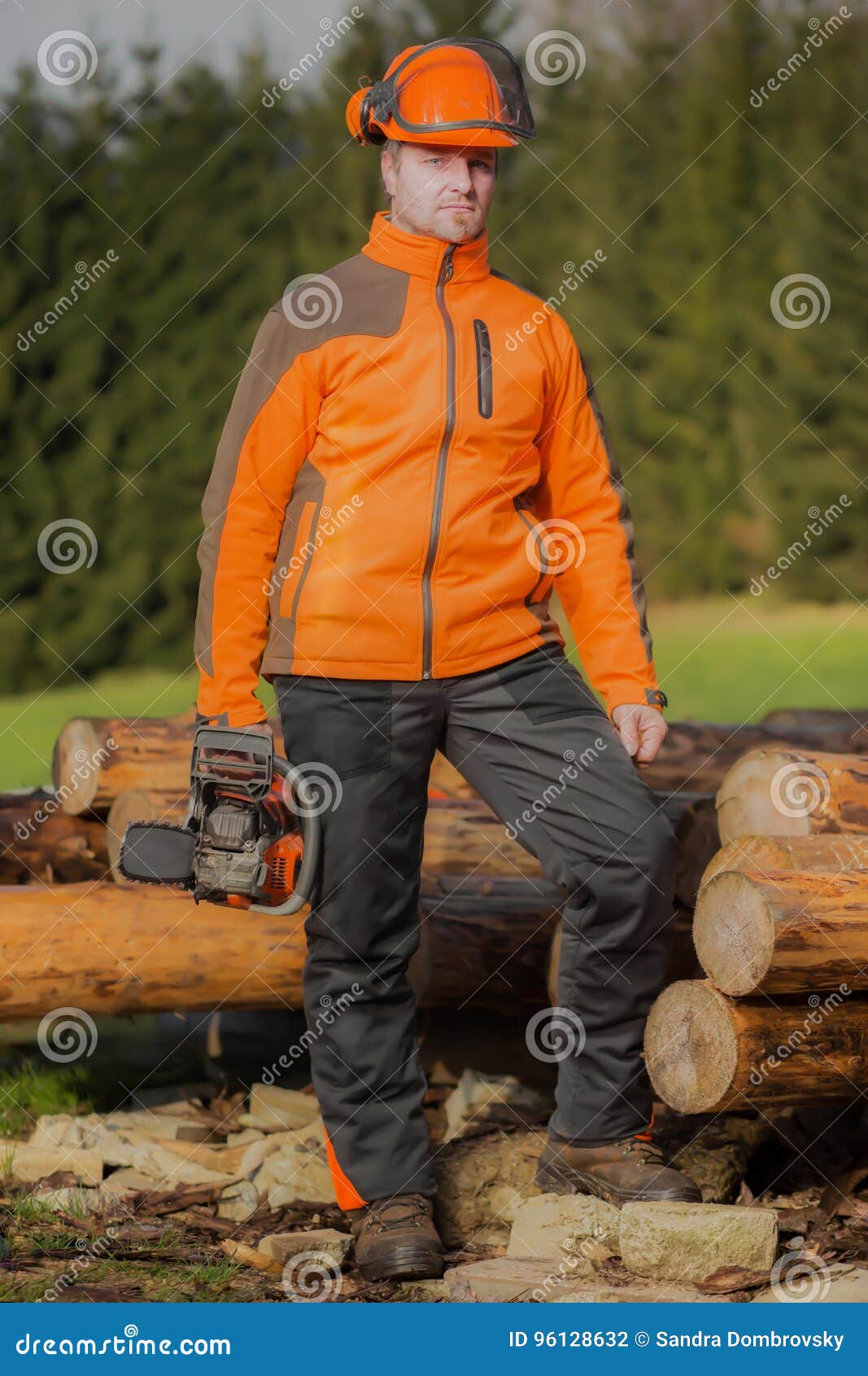 Man with chainsaw stock photo. Image of lumberman, machine - 96128632