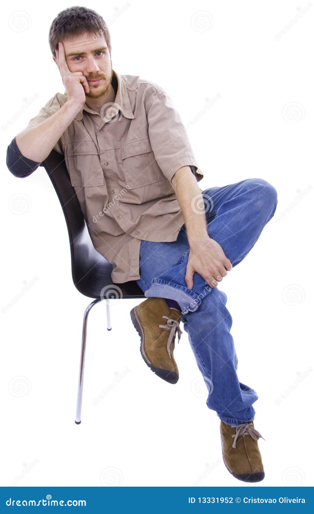 Man on a chair stock photo. Image of casual, looking - 13331952