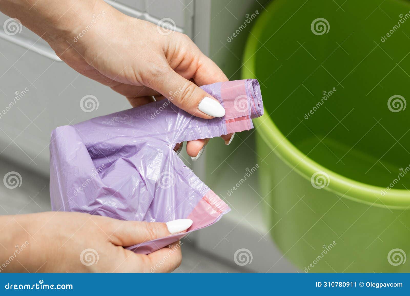 A Man Changes a Garbage Bag in a Bucket. Stock Image - Image of ...