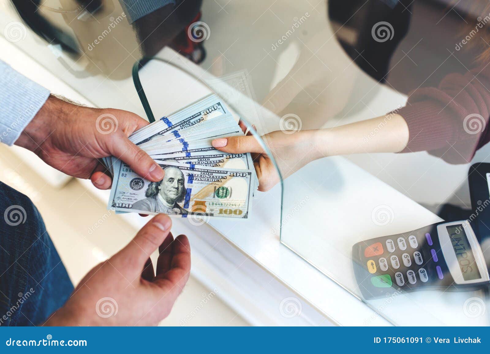 Man Changes Money in a Currency Exchange, a Large Sum of Dollars, an ...