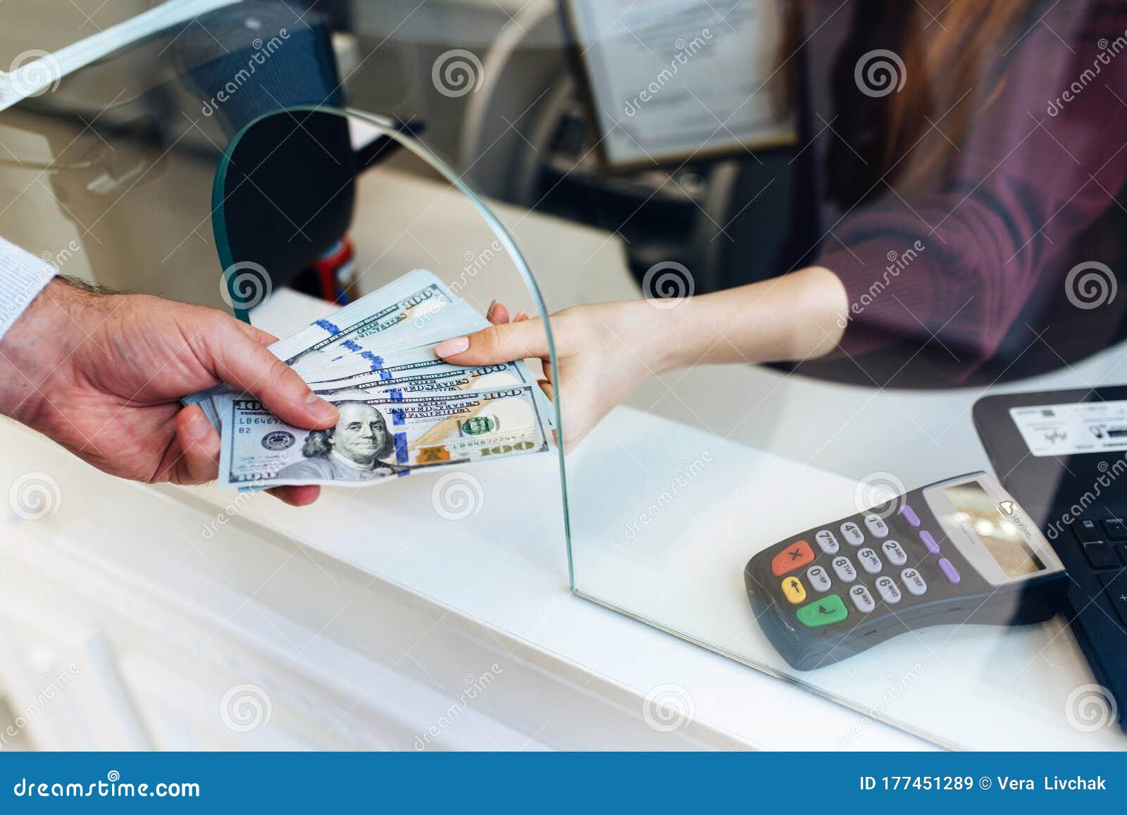 Man Changes Money in a Currency Exchange, a Large Sum of Dollars, an ...