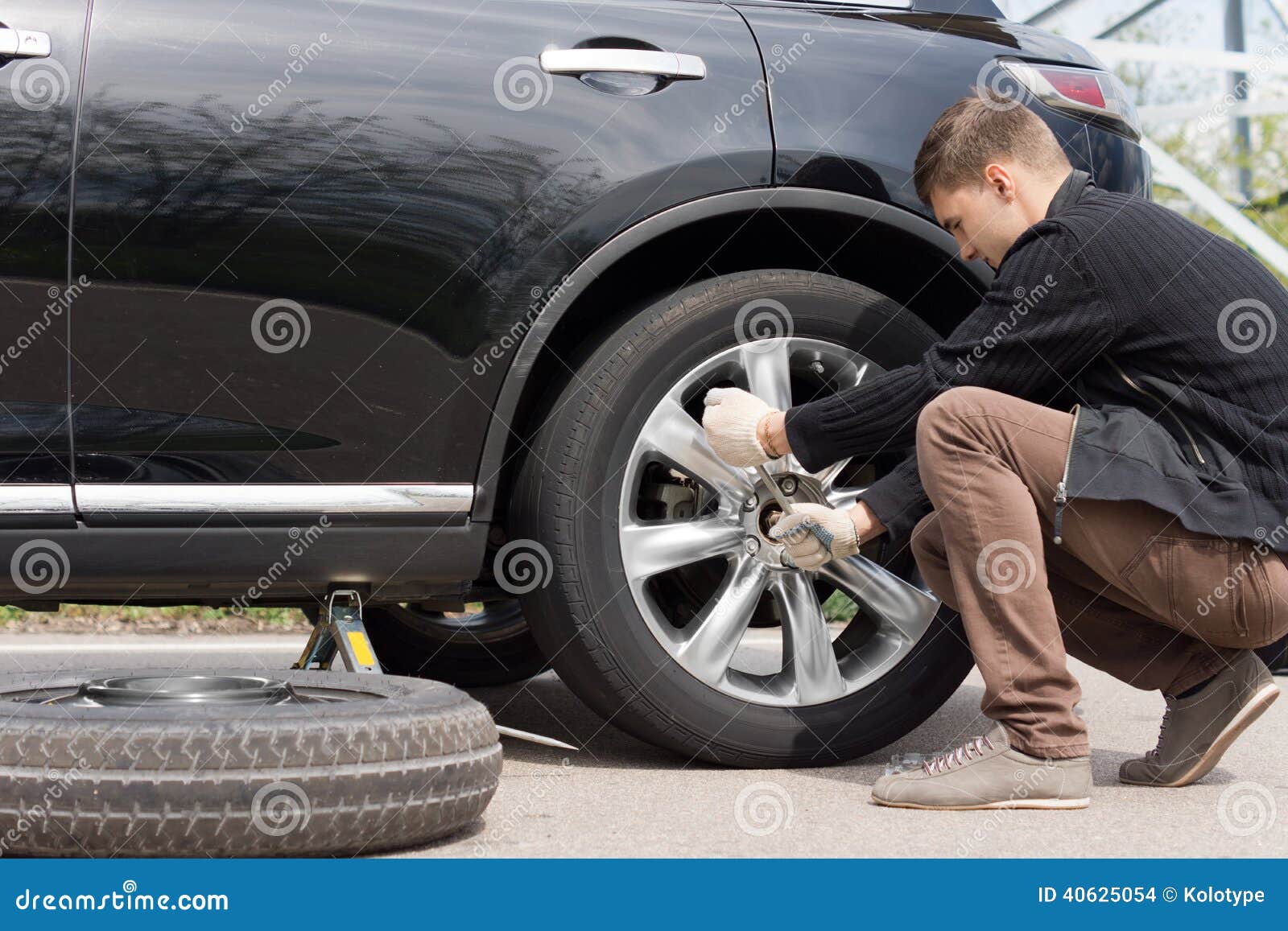 Man Changing His Spare Wheel Stock Photography | CartoonDealer.com ...