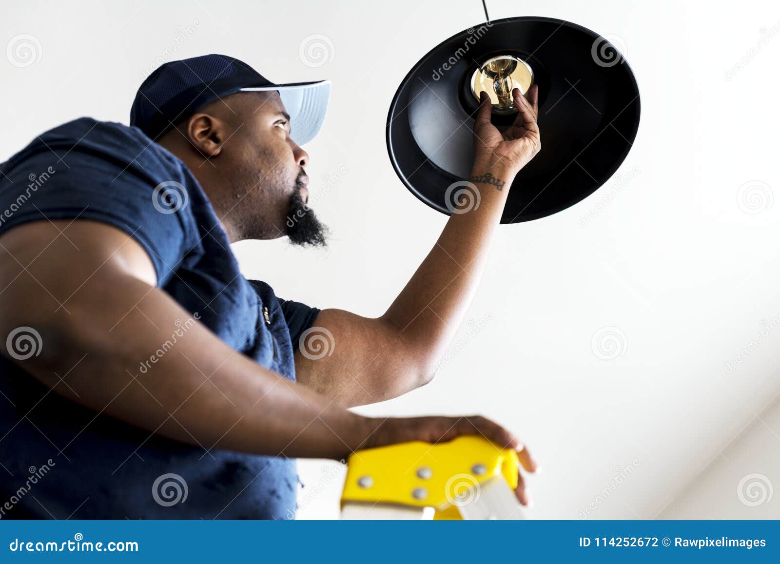 Man Changing Light Bulb Lamp Stock Photo - Image of homeowner, lamp ...