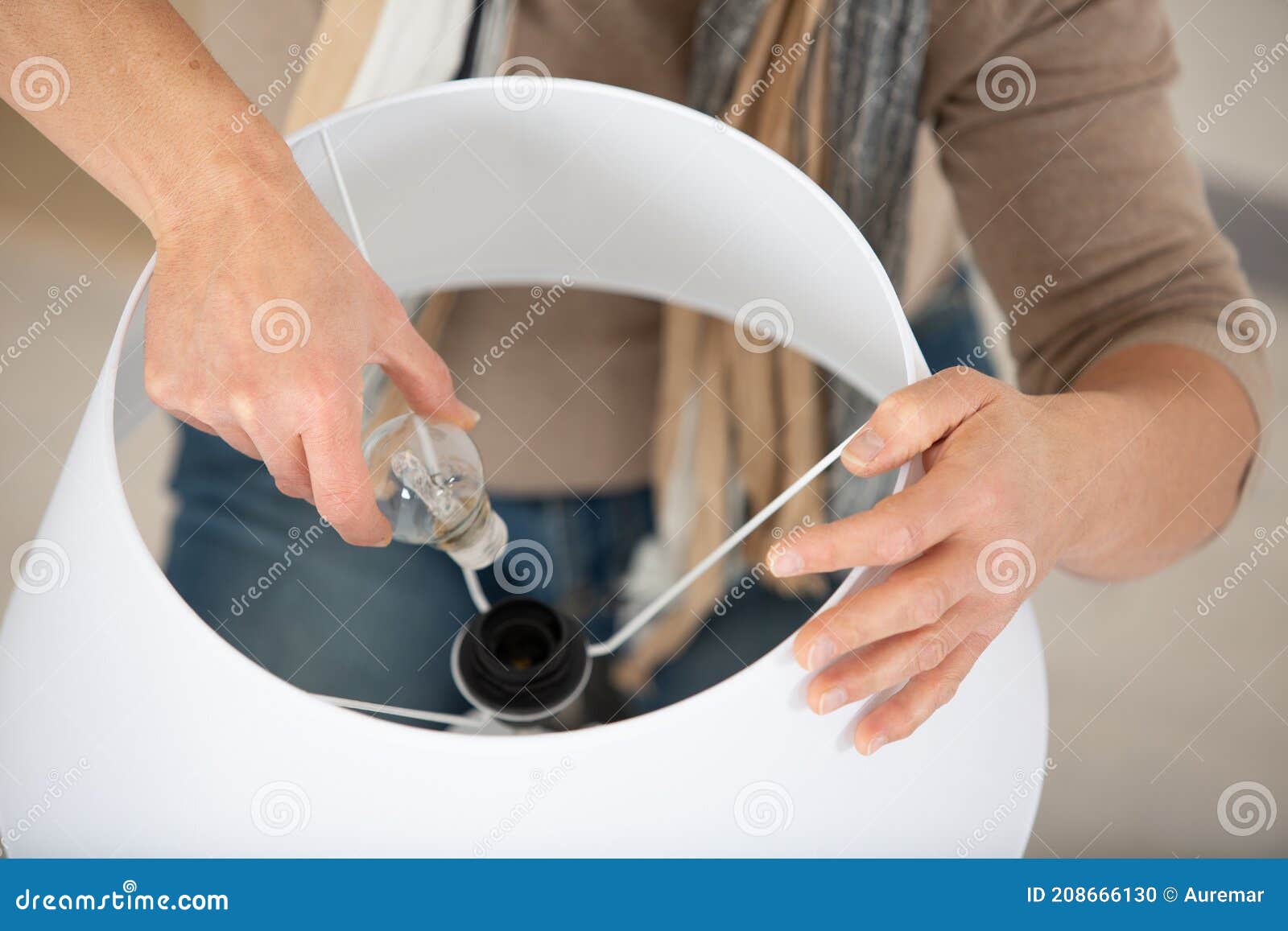 Man Changing Light Bulb in Lamp Indoors Stock Photo - Image of bulb ...