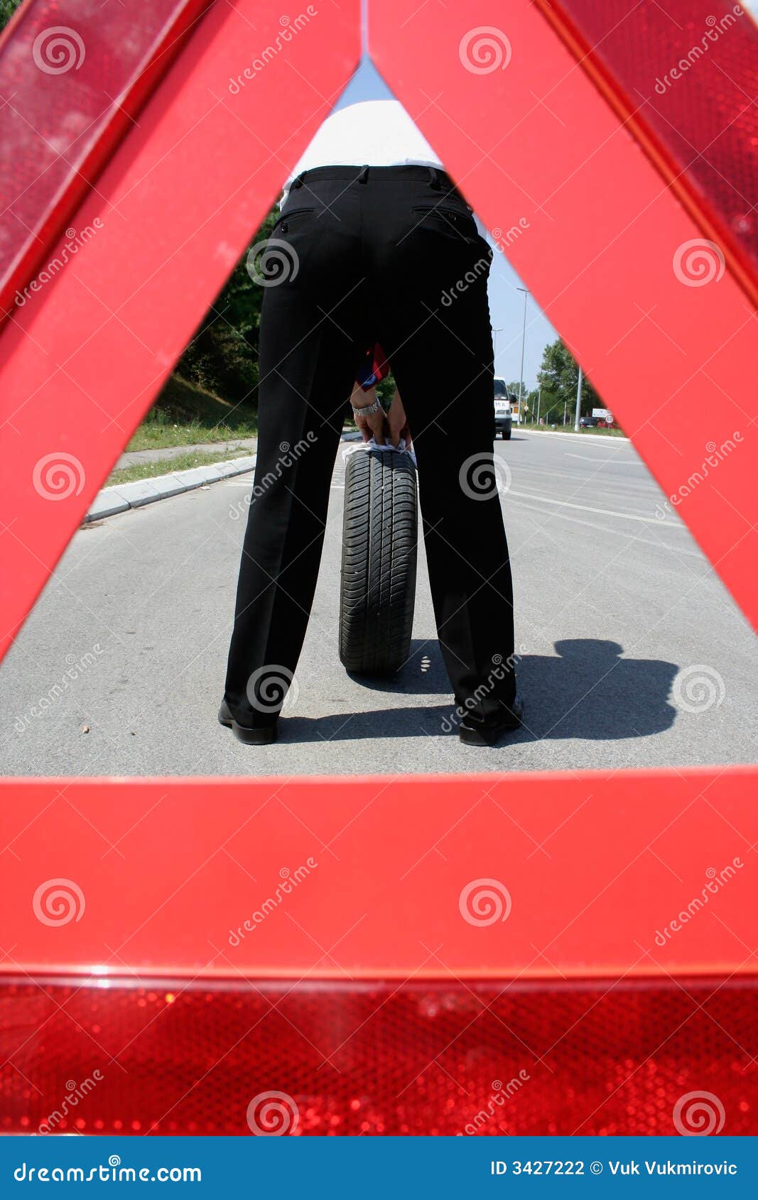 Man changing a tire stock photo. Image of change, clout - 3427222