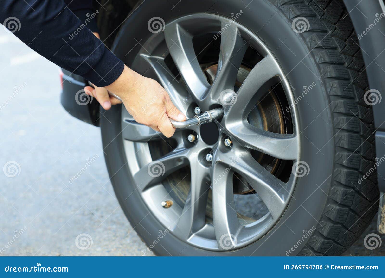 Man Changing Tire of Car Outdoors, Closeup Stock Photo - Image of ...