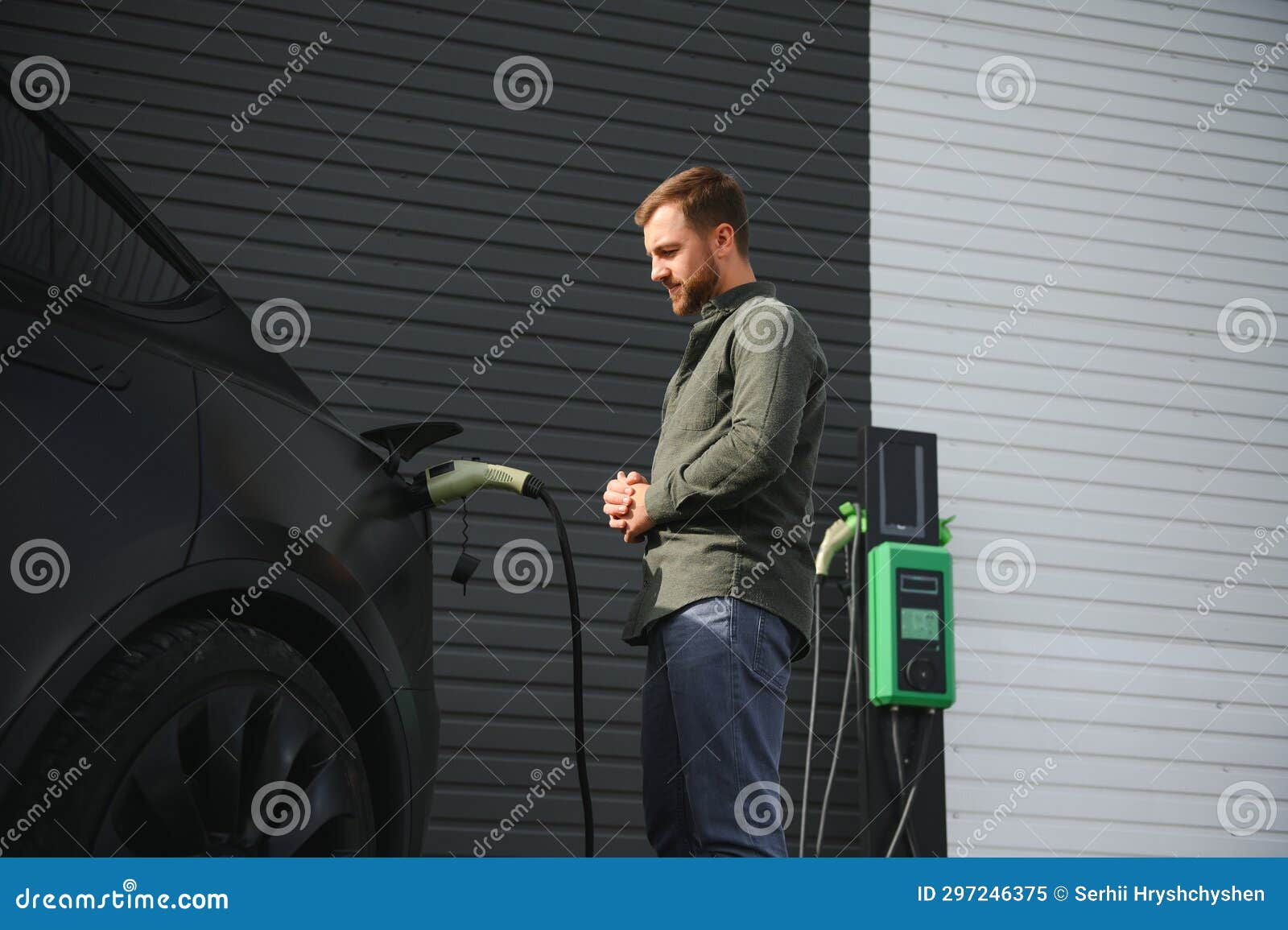 Man Charging Electric Car by the House Stock Image - Image of handsome ...