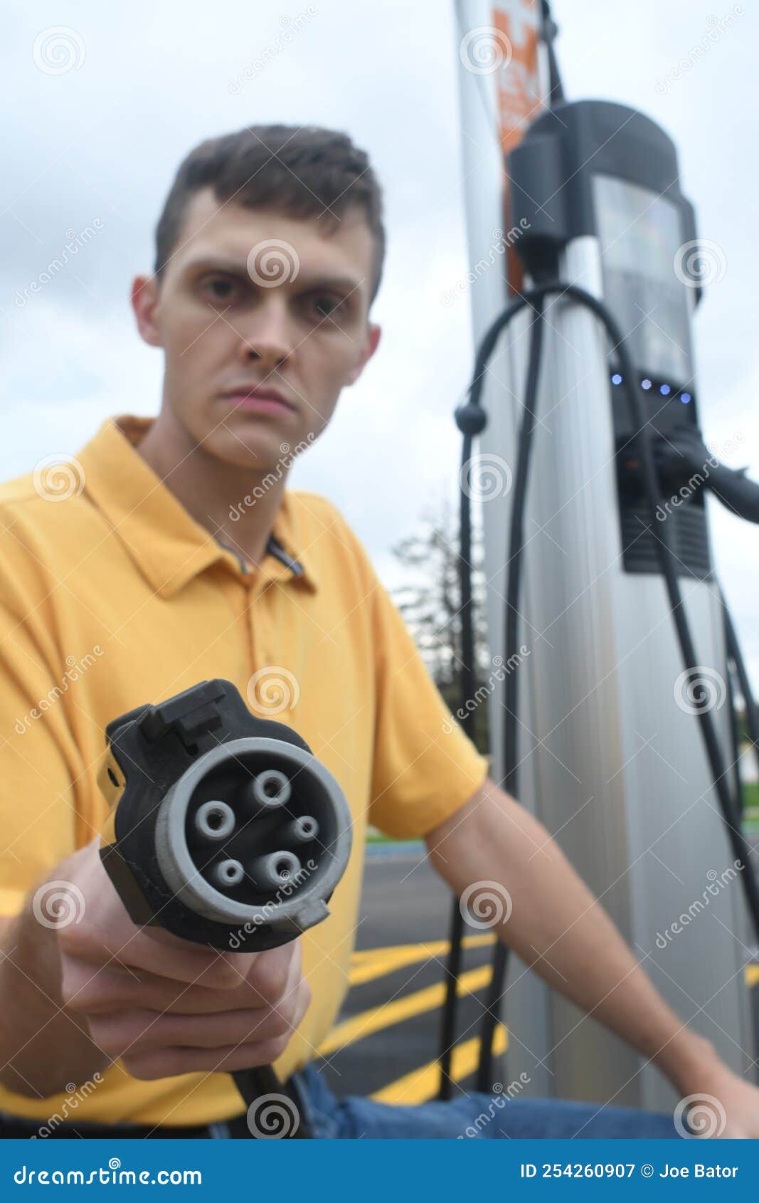 Man Charging His Electric Vehicle Stock Image - Image of battery ...