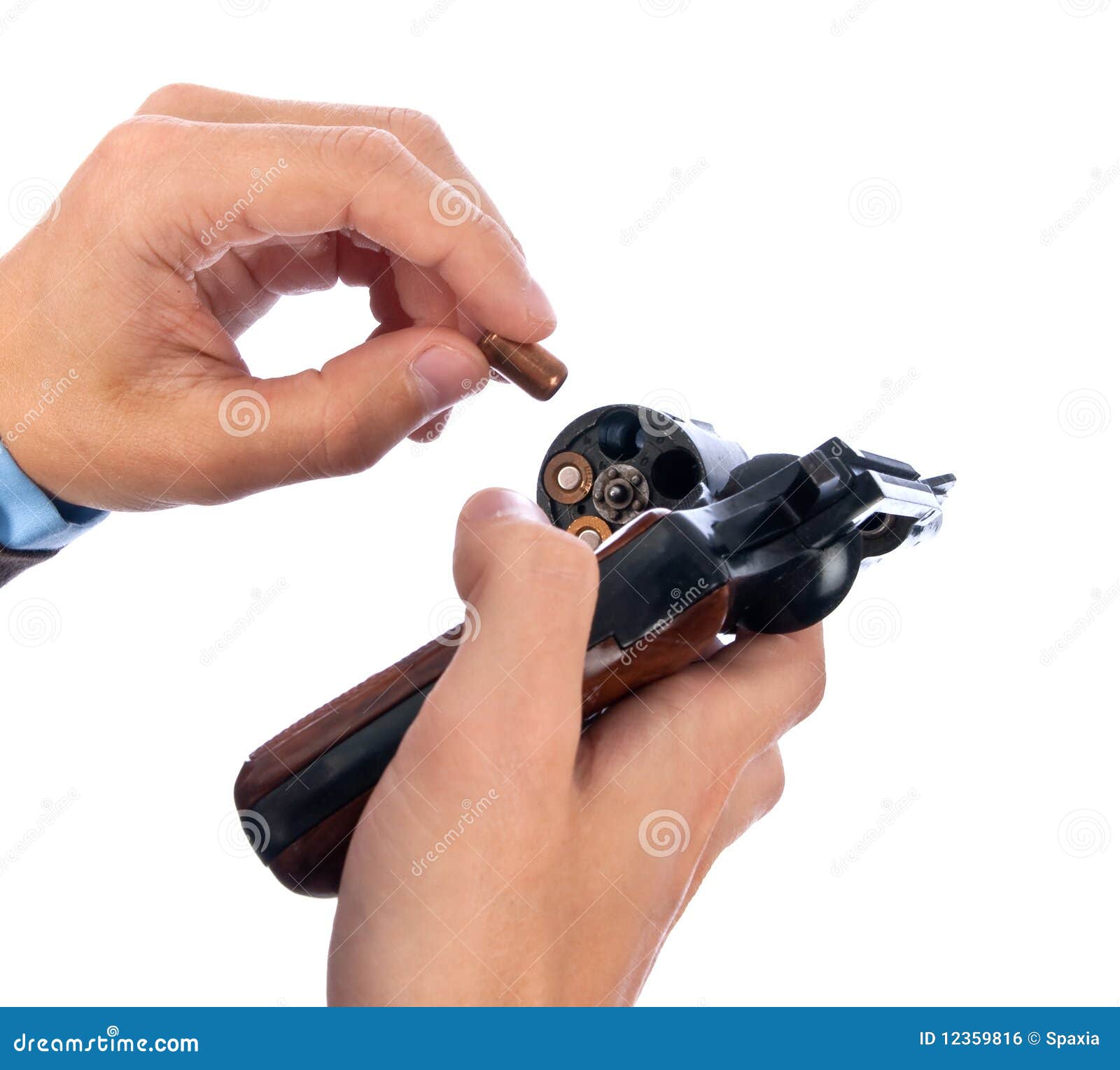 Man charging a pistol stock photo. Image of crime, danger - 12359816