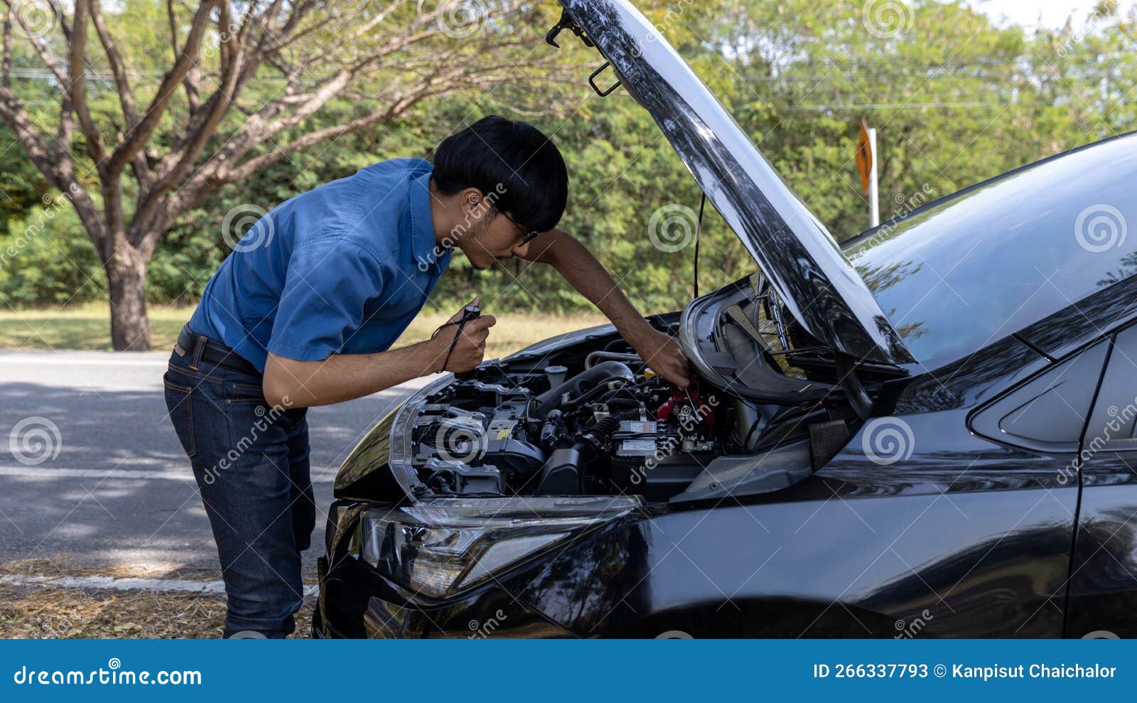 Man is Checking Car Battery because Car Battery is Depleted. Concept ...
