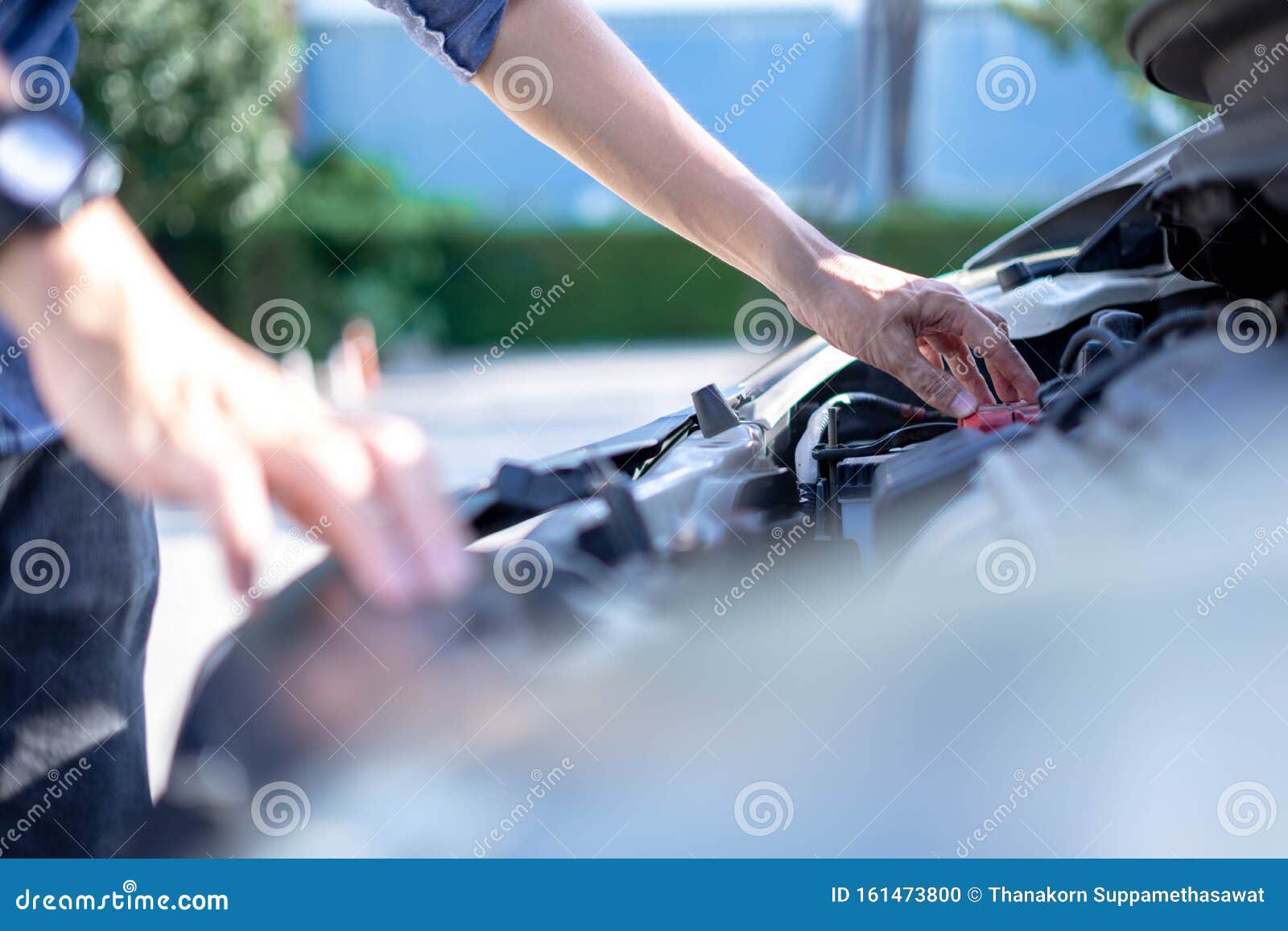 A Man Checking Car Engine, Check and Maintenance the Battery in Car ...