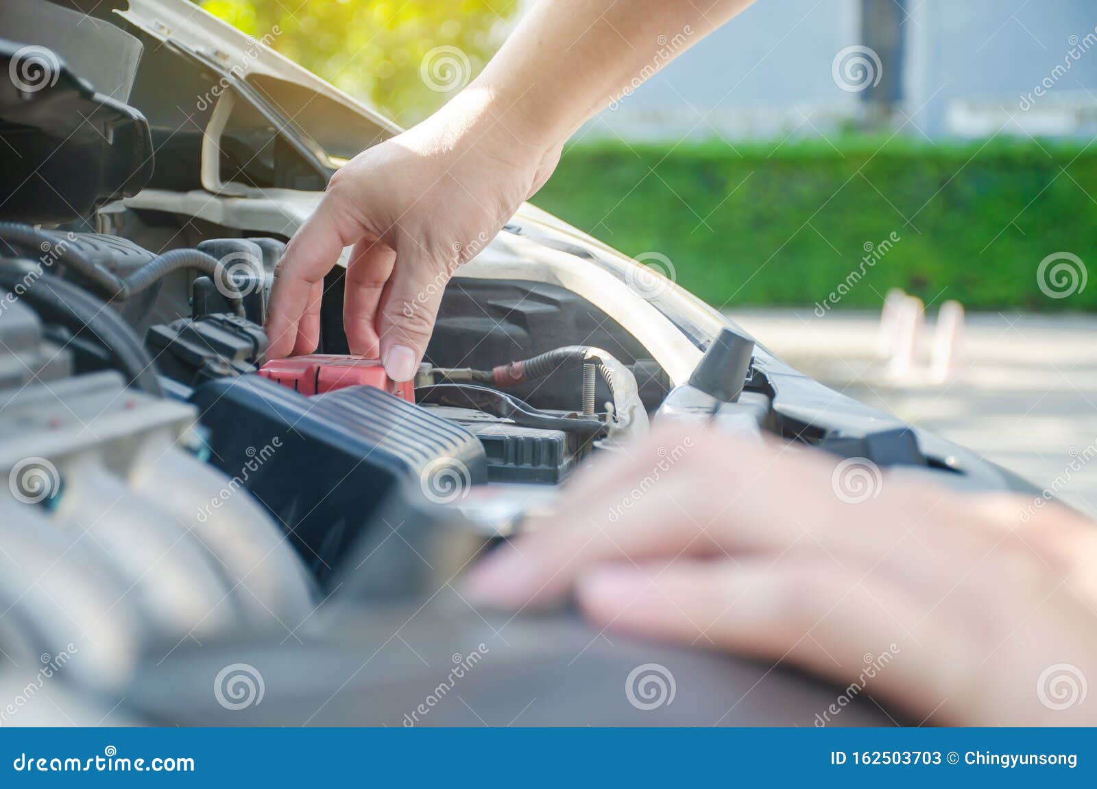 Man Checking Car Engine, Check and Maintenance the Battery in Car with ...