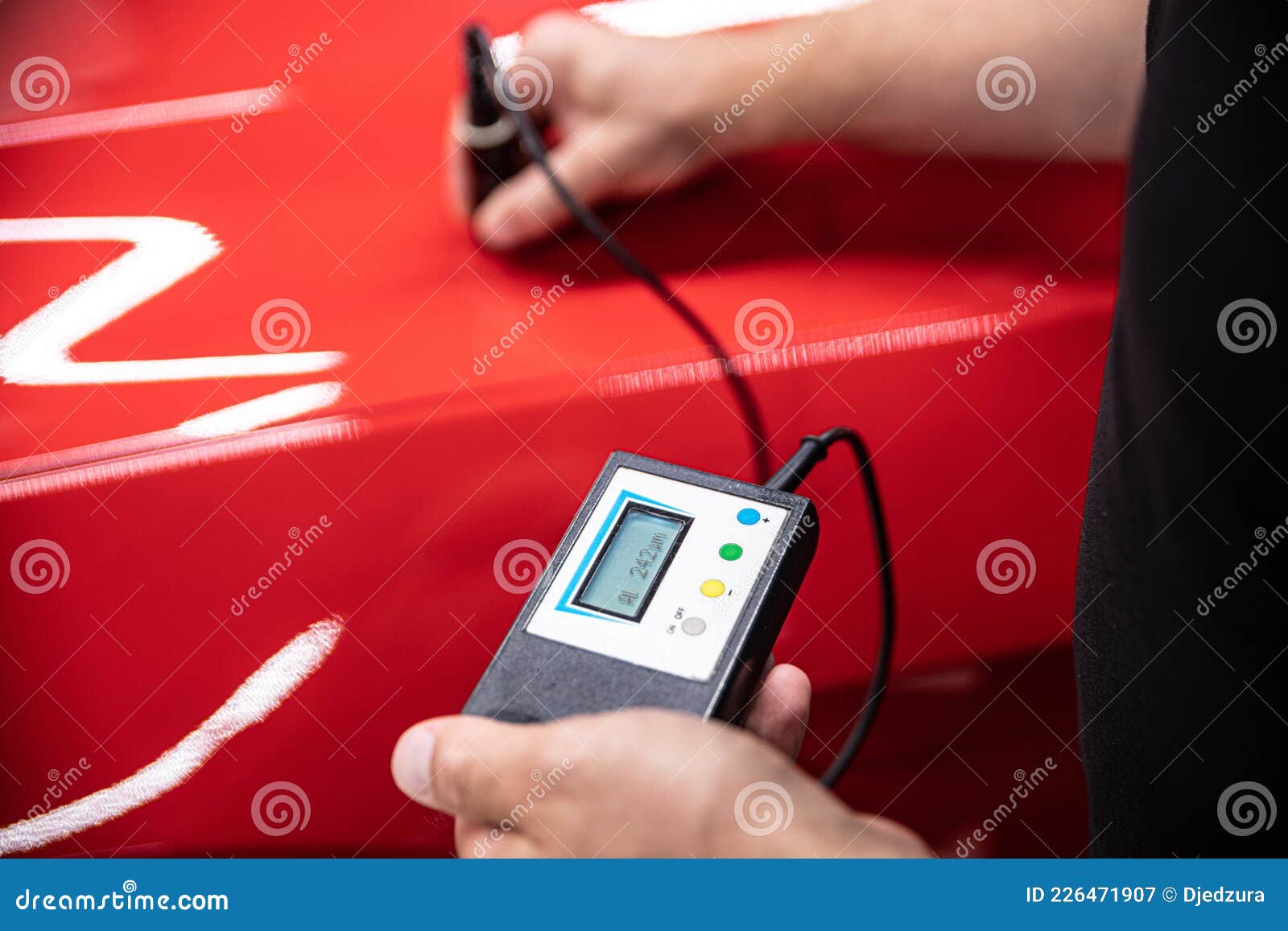 Man Mechanic Checking Car Paint Thickness with Electronic Meter Stock ...