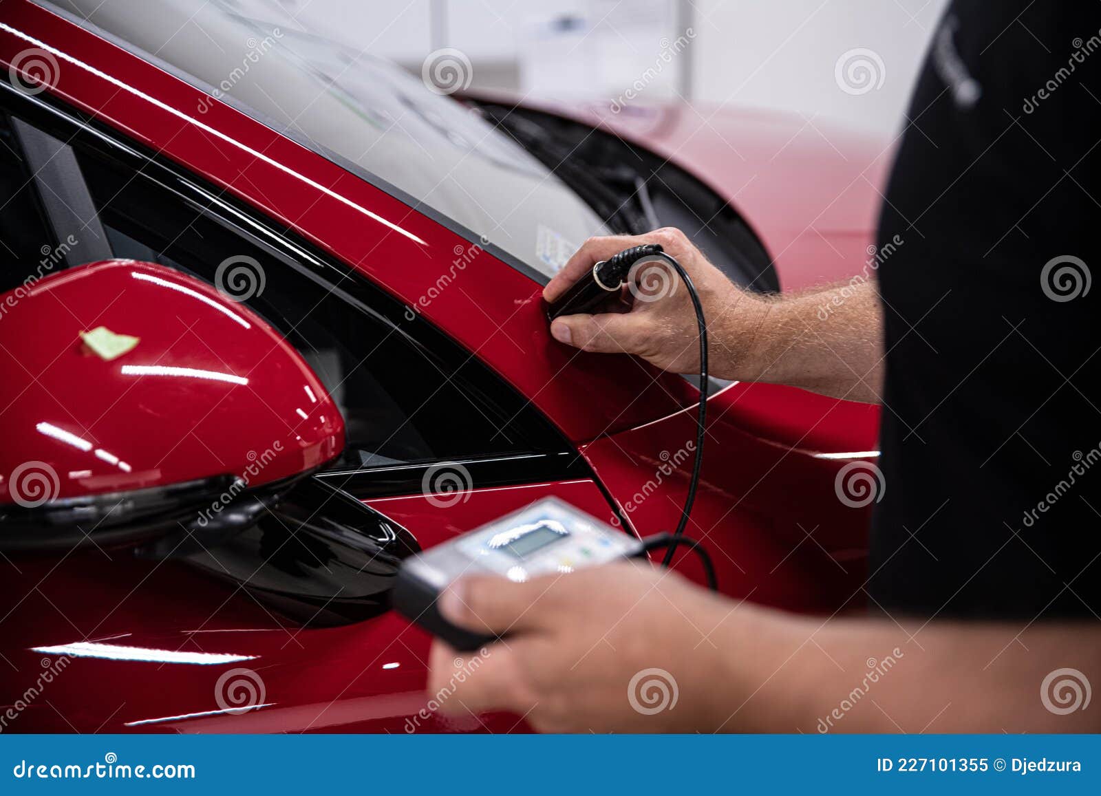 Man Mechanic Checking Car Paint Thickness with Electronic Meter Stock ...