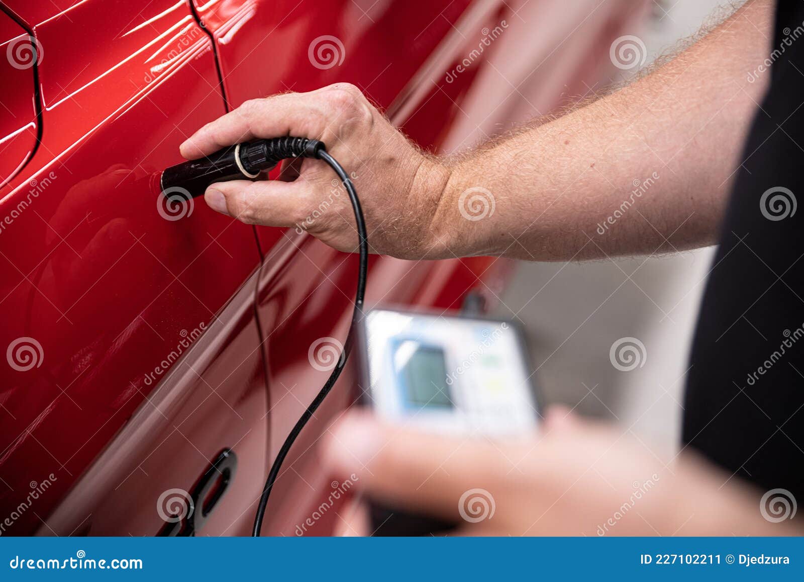 Man Mechanic Checking Car Paint Thickness with Electronic Meter Stock ...