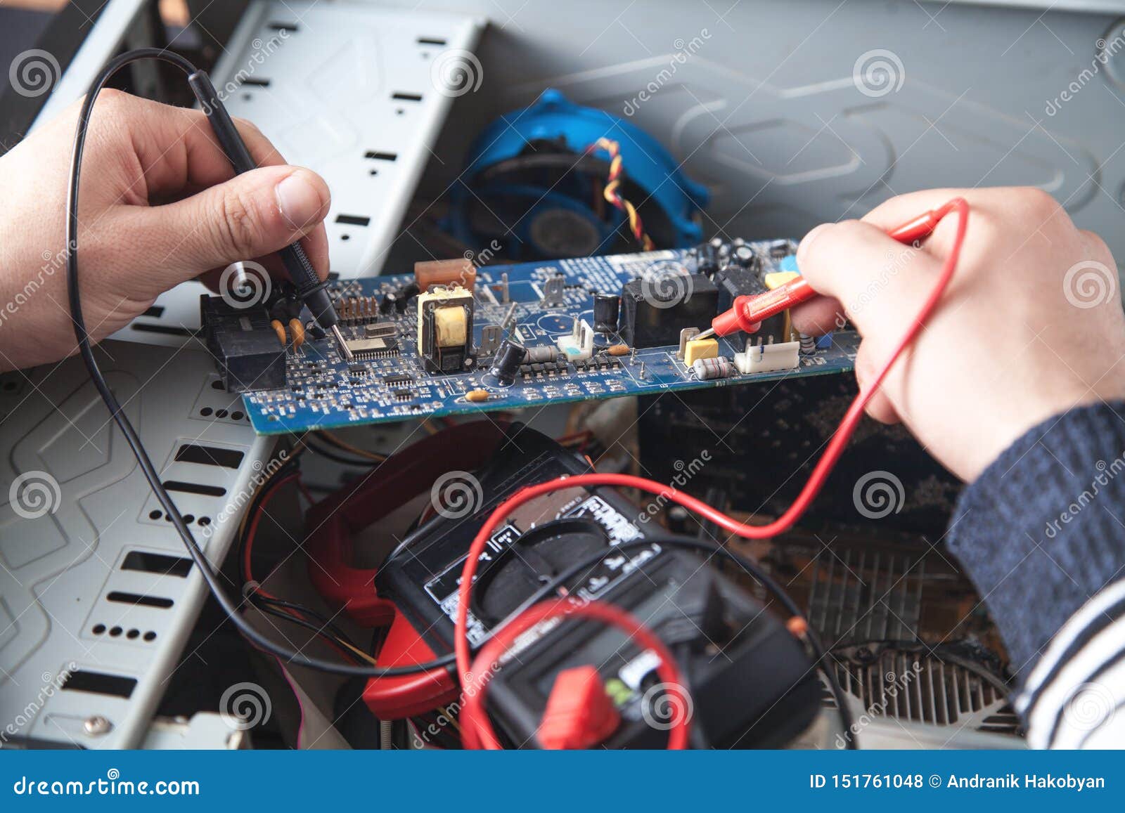 Man Checking Computer with a Multimeter Stock Photo - Image of repair ...