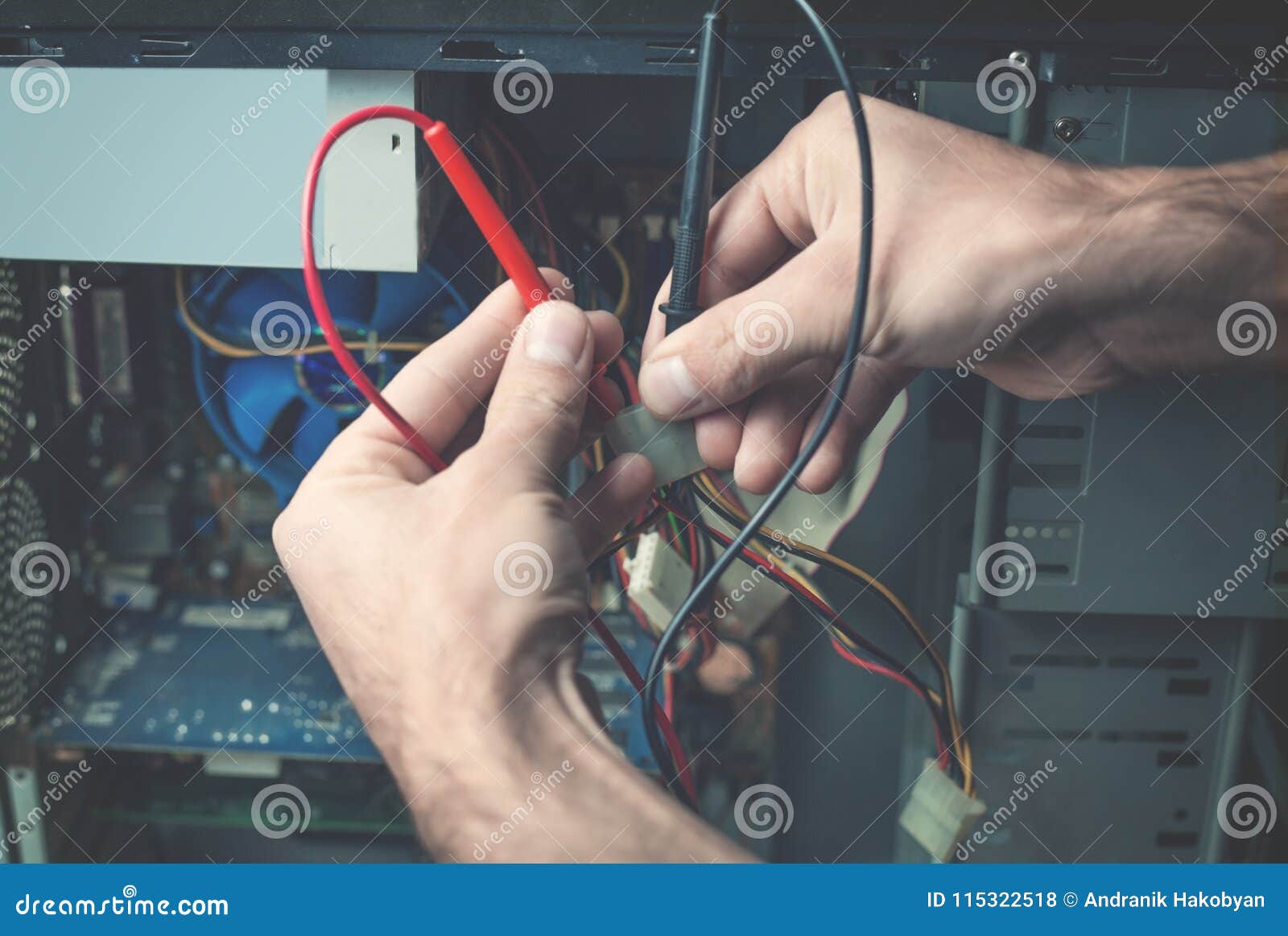 Man Checking Computer with a Multimeter. Stock Photo - Image of tester ...