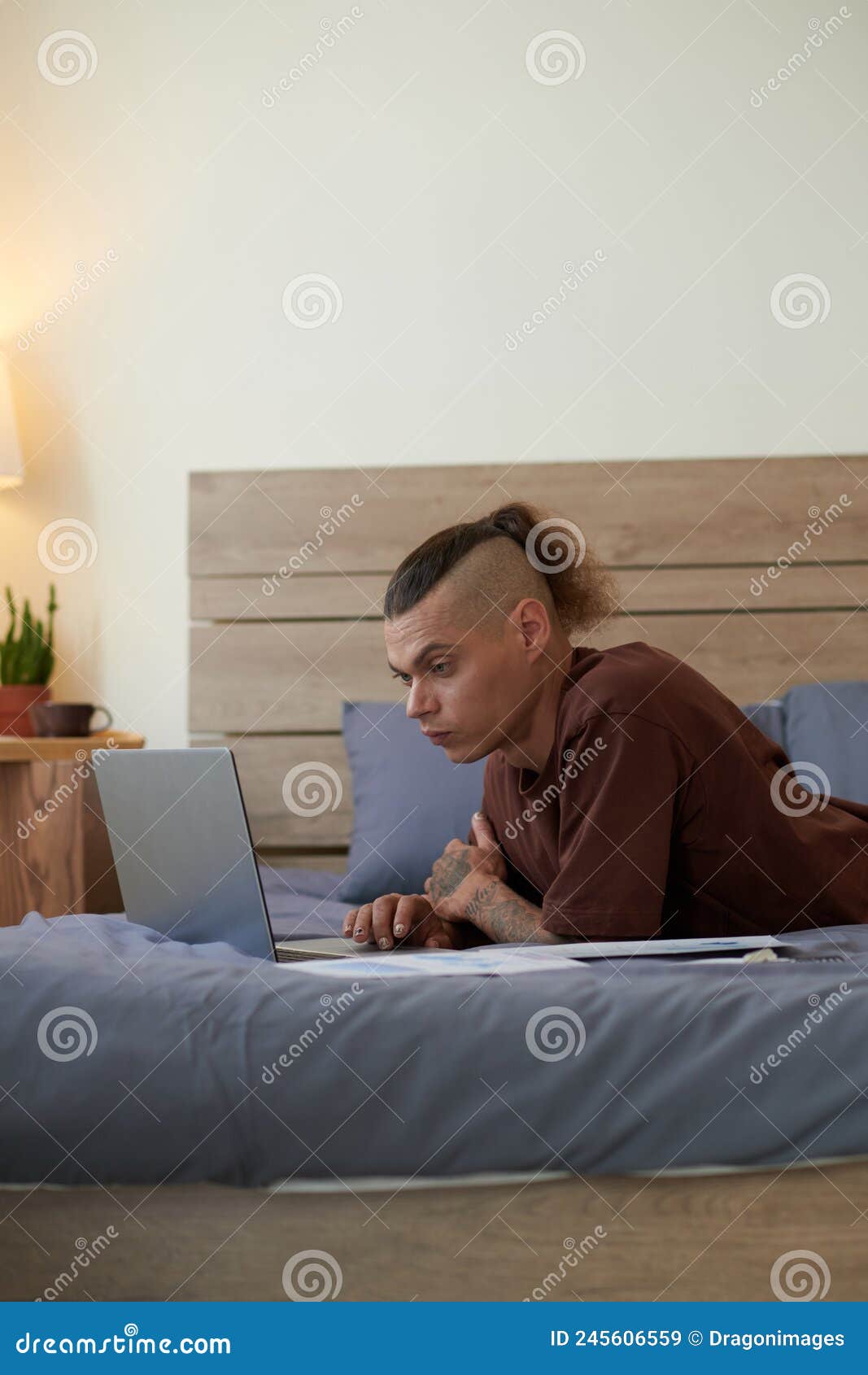 Man Checking Documents on Laptop Stock Image - Image of distant ...
