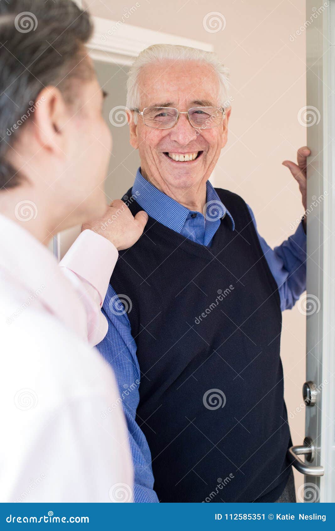 Man Checking on Elderly Male Neighbor Stock Image - Image of caucasian ...