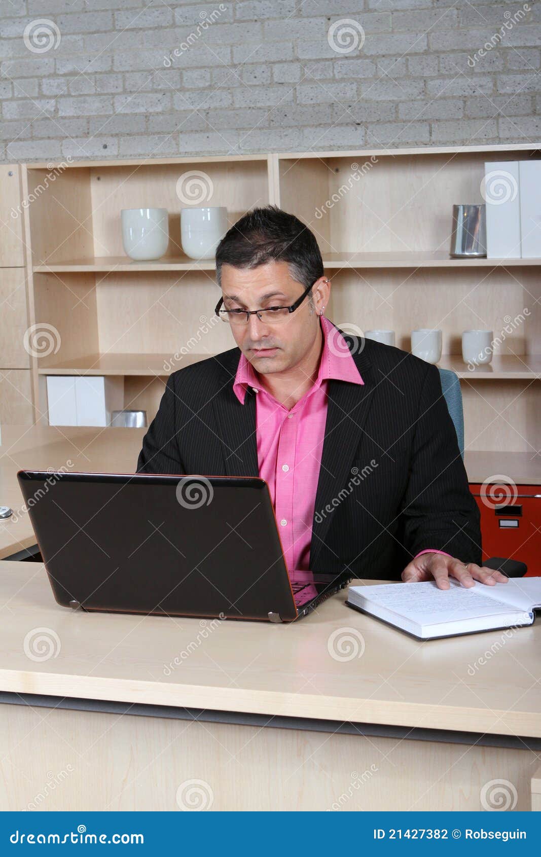 Man checking his email stock photo. Image of employee - 21427382