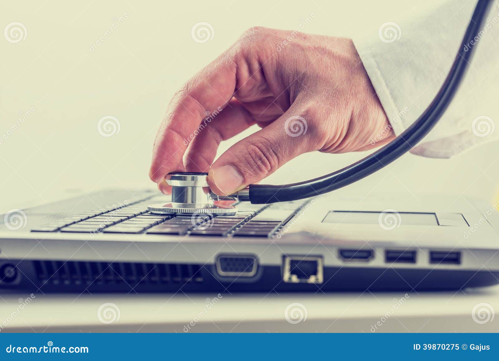Man Checking His Laptop with a Stethoscope Stock Image - Image of ...