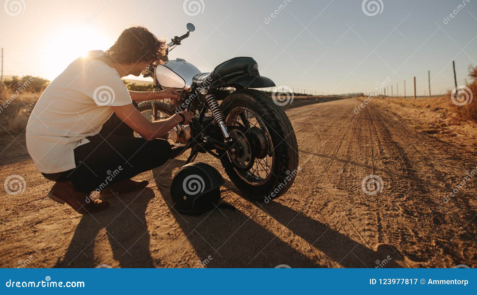 Man Checking His Motorcycle On Country Road Stock Image Image Of Bike Riding 123977817